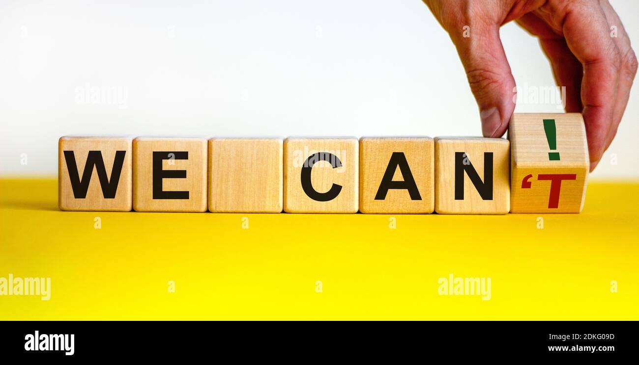 We can symbol. Hand turns a cube and changes the words 'we can't' to ...