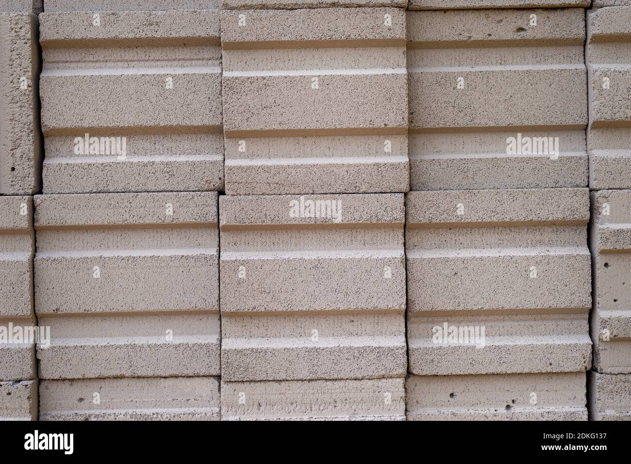 Pile of construction blocks - as a background Stock Photo - Alamy