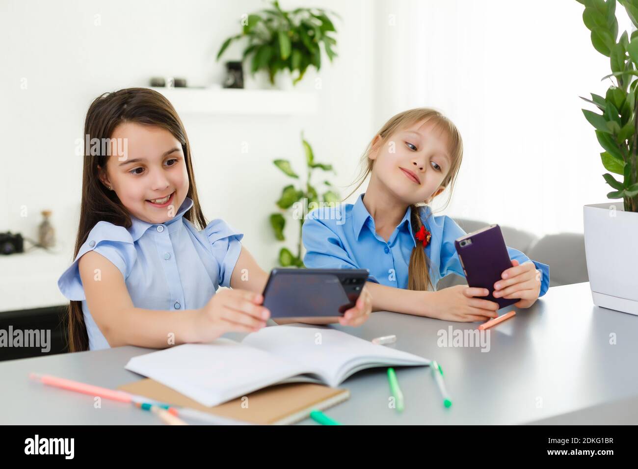 two little girls studying online. Distance Learning Online, e-learning ...