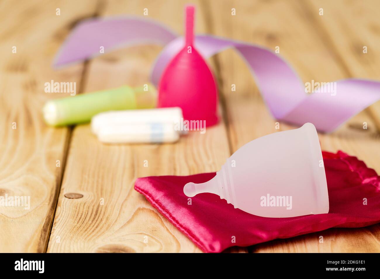 Menstrual cup and medical tampon close up Stock Photo - Alamy