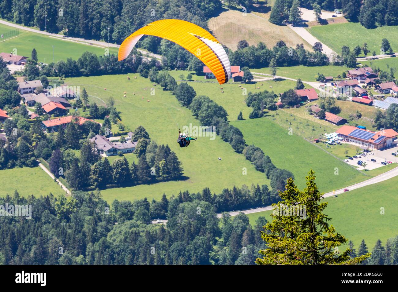 Paraglider pilots over Rottach-Egern, Tegernsee, Bavarian Alps, Bavaria ...
