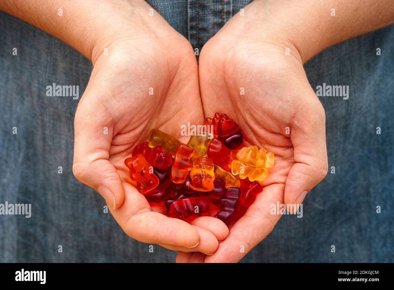 Gummy bears and hand hi-res stock photography and images - Alamy