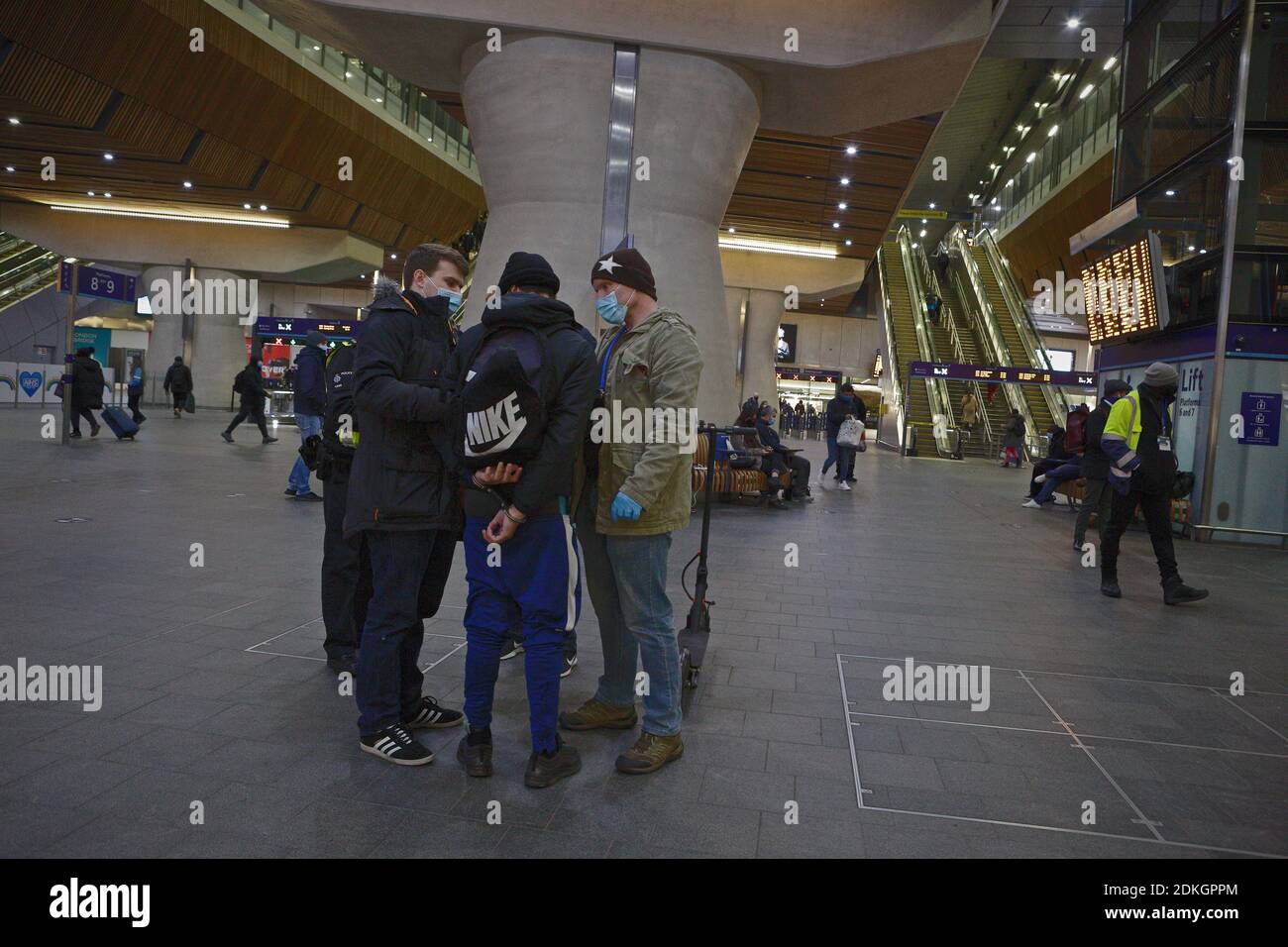 London (UK), 15 December 2020: British Transport police handcuff and ...