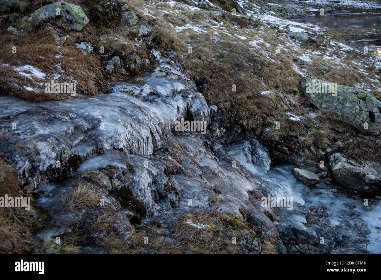frozen mountain stream Stock Photo - Alamy