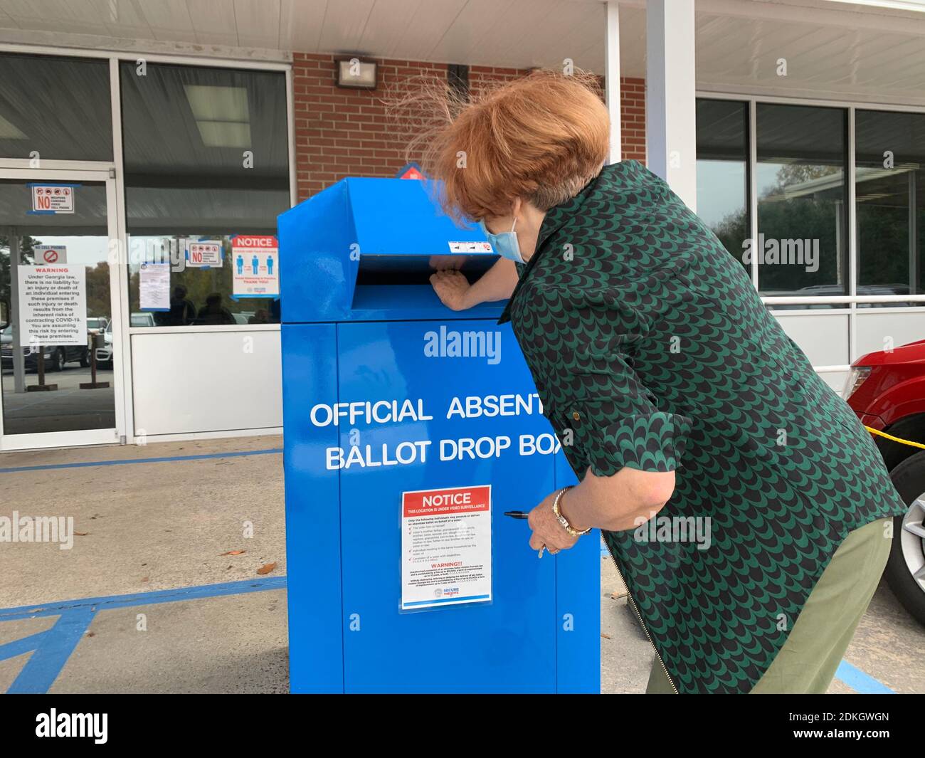 Savannah, Georgia, USA. 15th Dec, 2020. Georgia voter Gail Toffee drops ... Savannah, Georgia, USA. 15th Dec, 2020. Georgia voter Gail Toffee drops ...