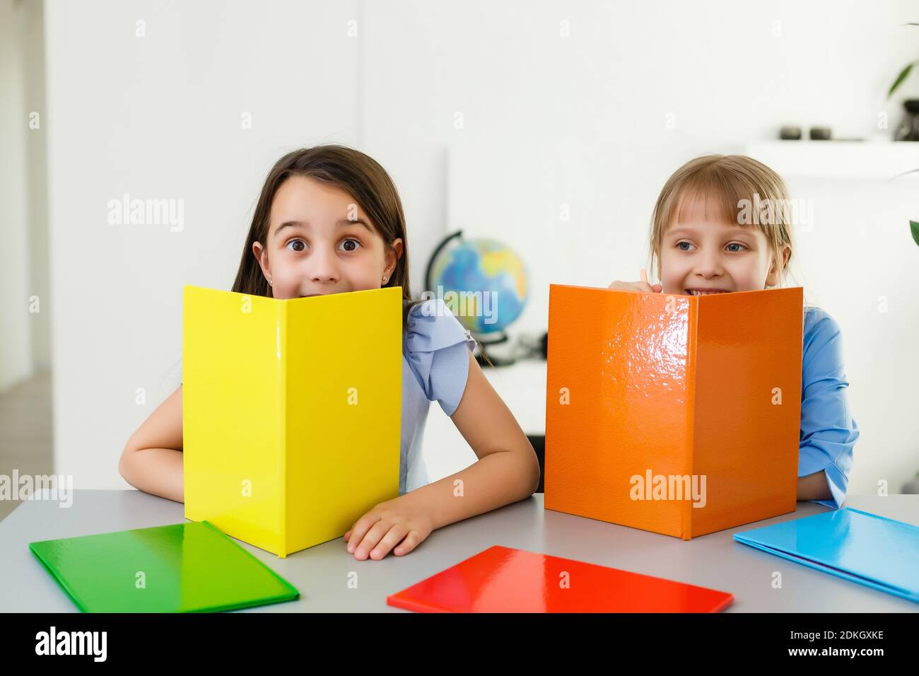two little girls studying online. Distance Learning Online, e-learning ...