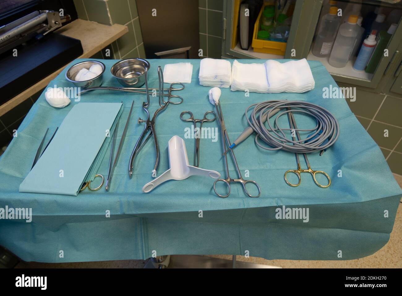 on an operating table are the instruments for a proctoscopic operation ...