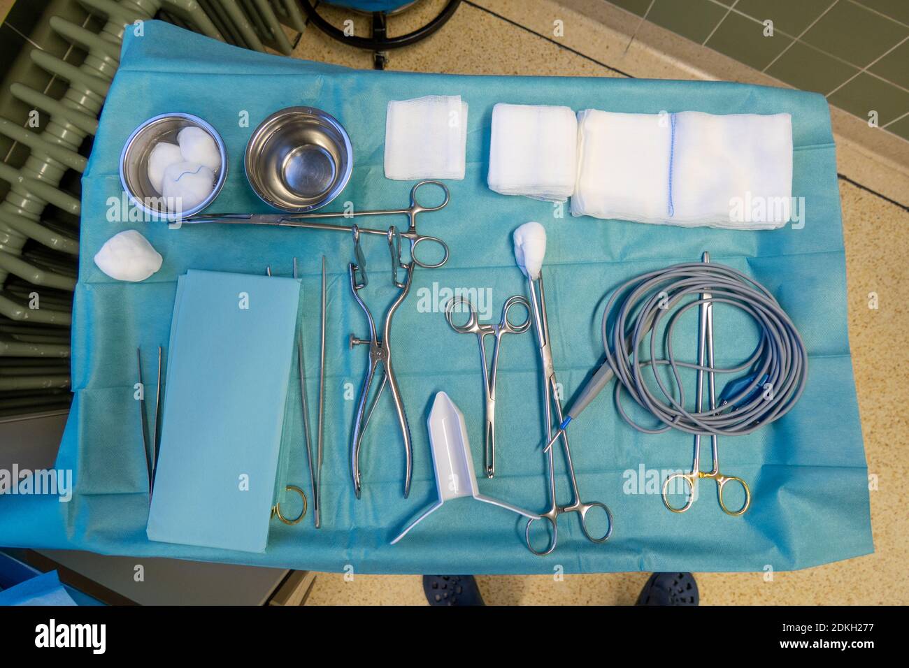 on an operating table are the instruments for a proctoscopic operation ...