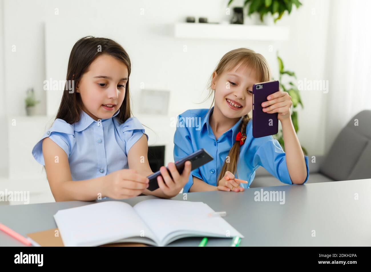 two little girls studying online. Distance Learning Online, e-learning ...
