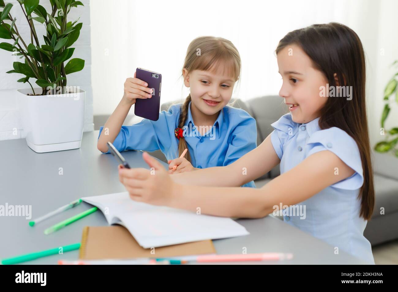two little girls studying online. Distance Learning Online, e-learning ...