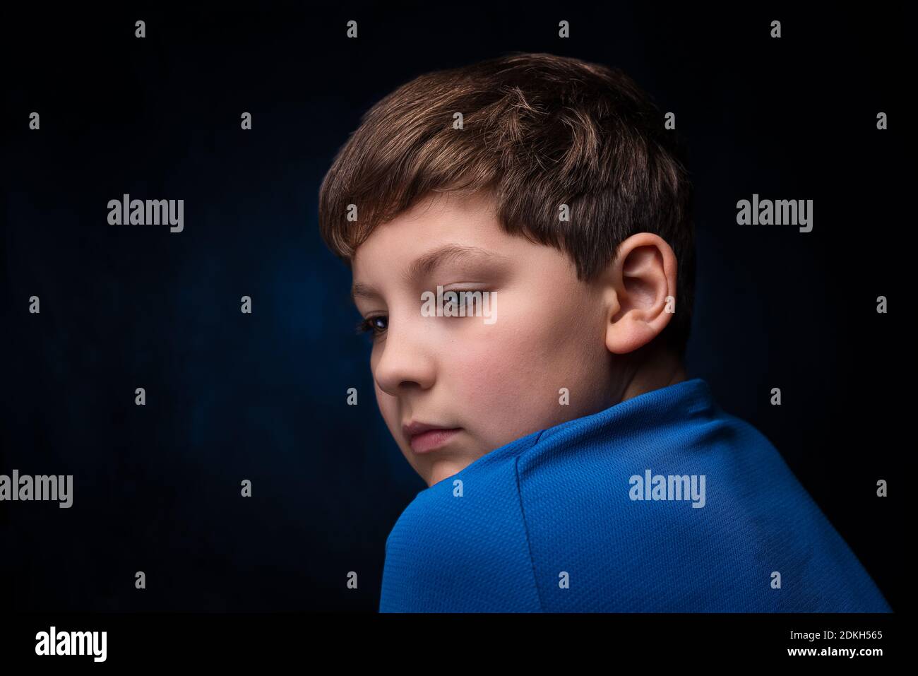 close up side view portrait of white european teenage boy with light ...
