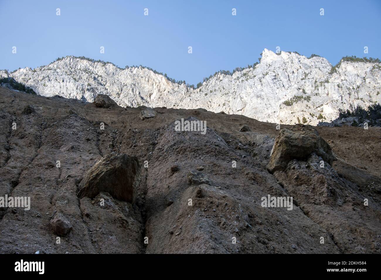 Dangerous stones in the mountain stream, peaks in the sun Stock Photo ...