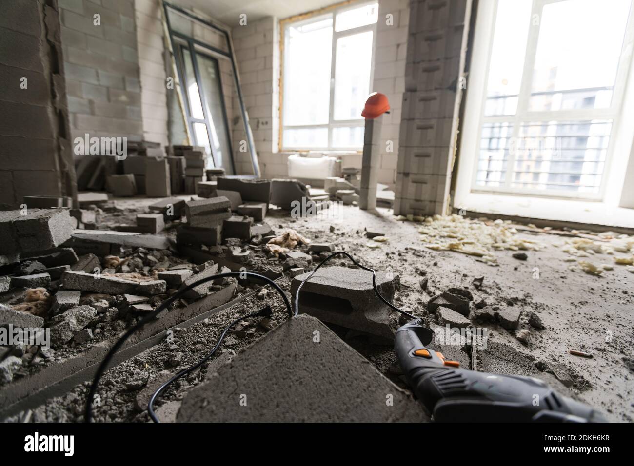 Wall smashed into debris room in apartment ready for renovation with ...