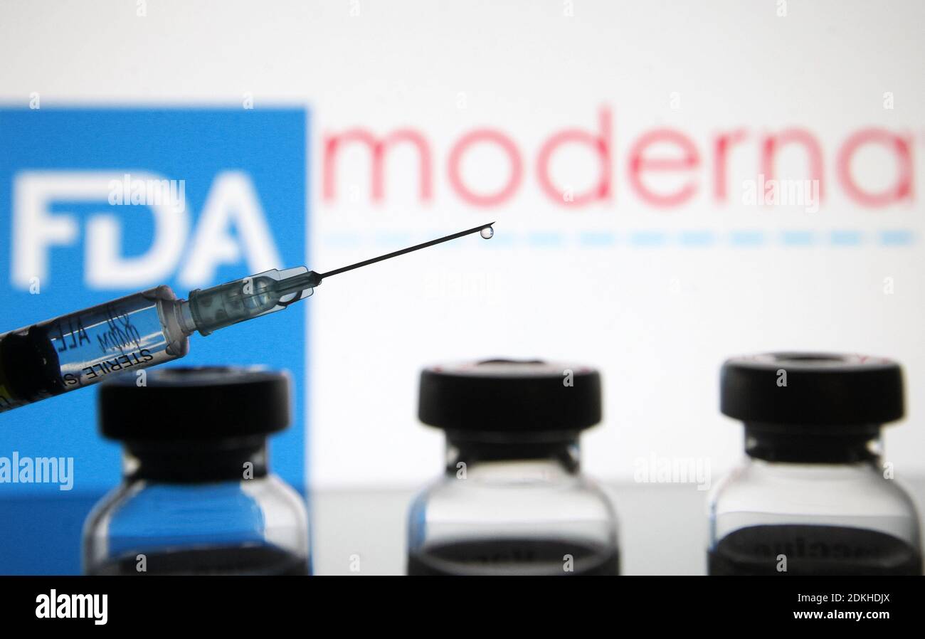 In this photo illustration, vials and a medical syringe seen displayed ...