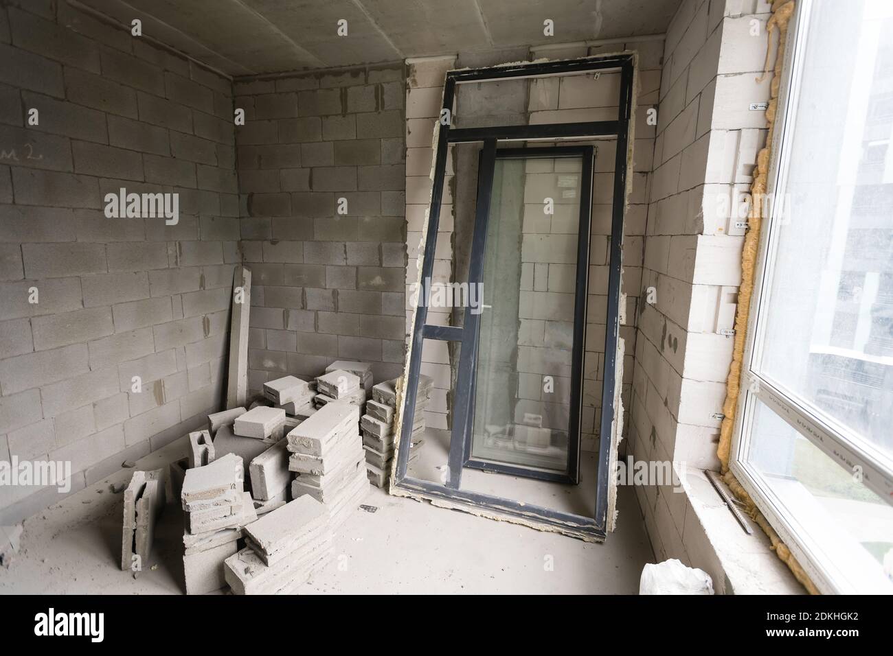 Wall smashed into debris room in apartment ready for renovation with ...