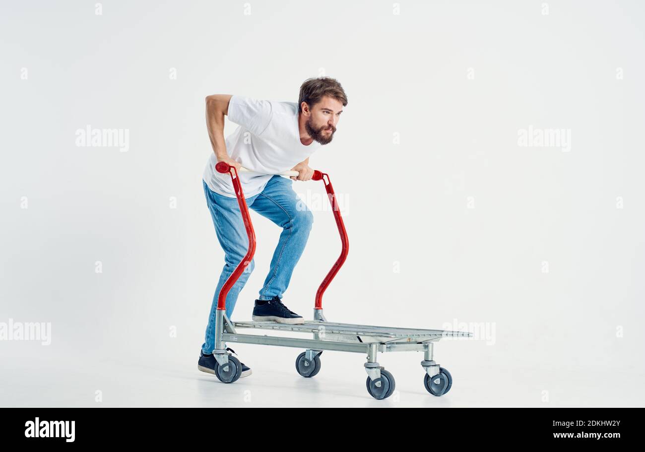 Transporting heavy bag hi-res stock photography and images - Alamy