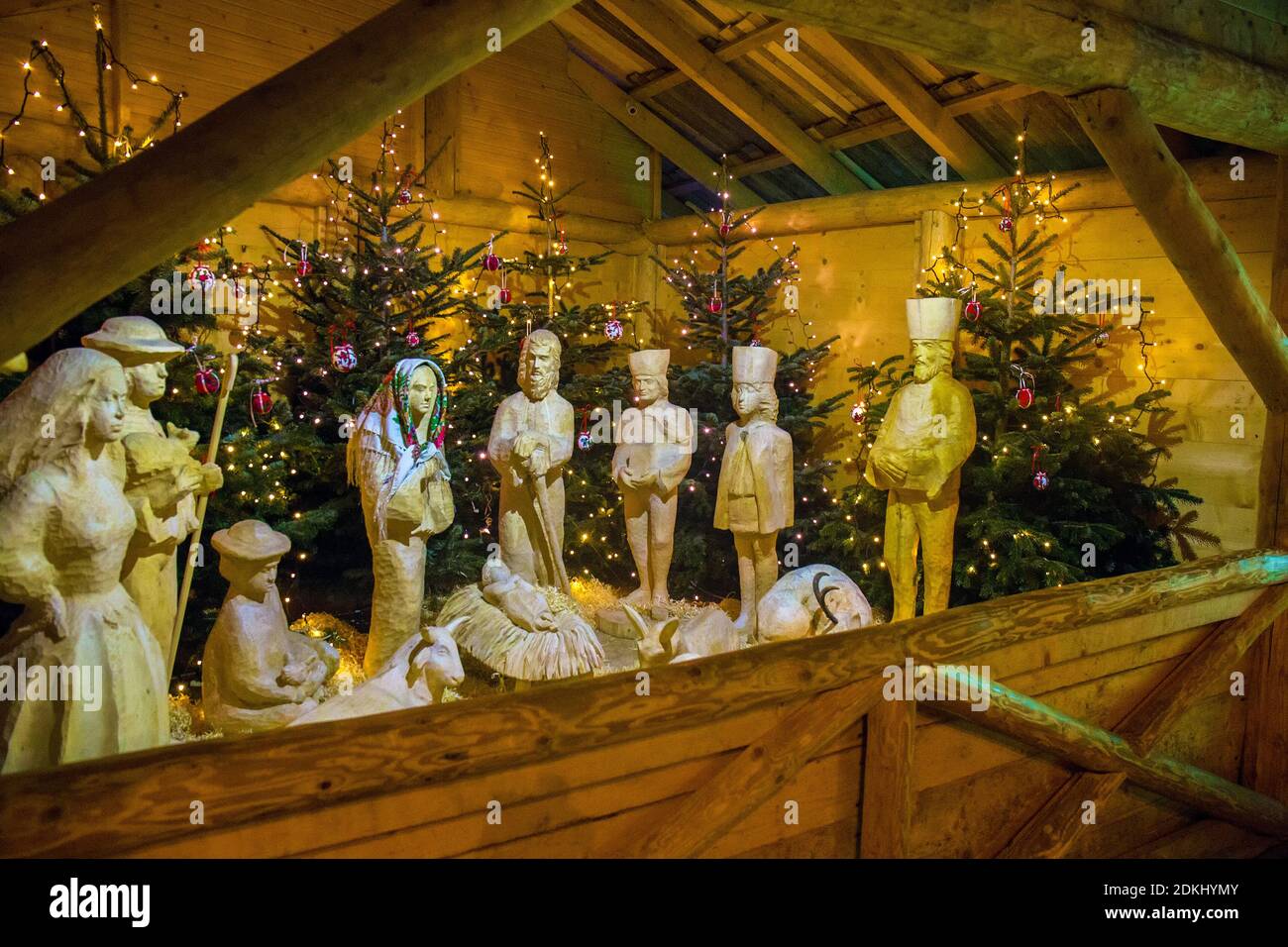typical wooden statues of the birth of Jesus in a stable with a ...
