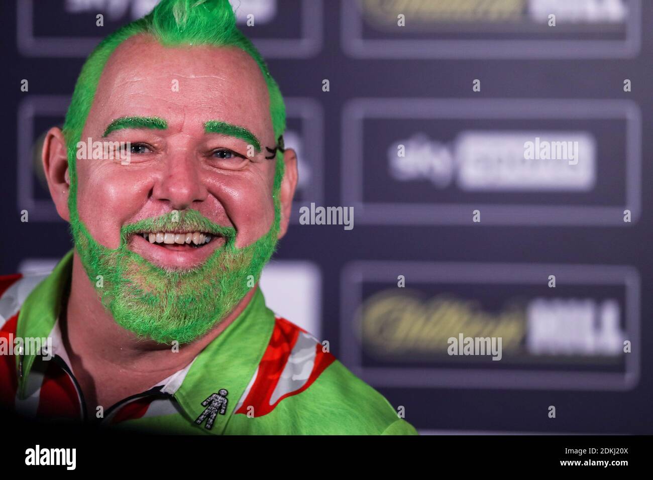 Peter Wright smiles during an interview during day one of the William ...