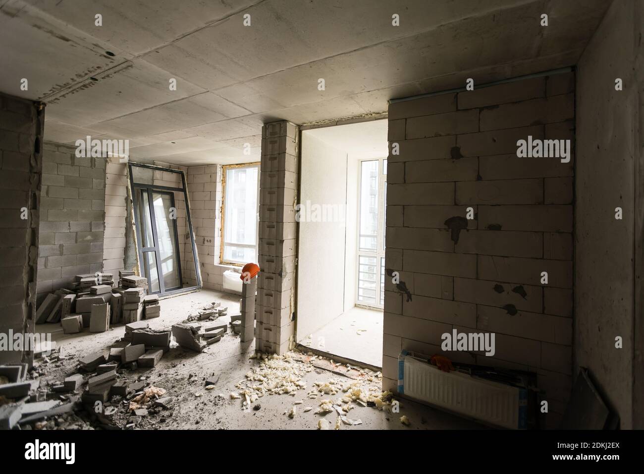 Wall smashed into debris room in apartment ready for renovation with ...