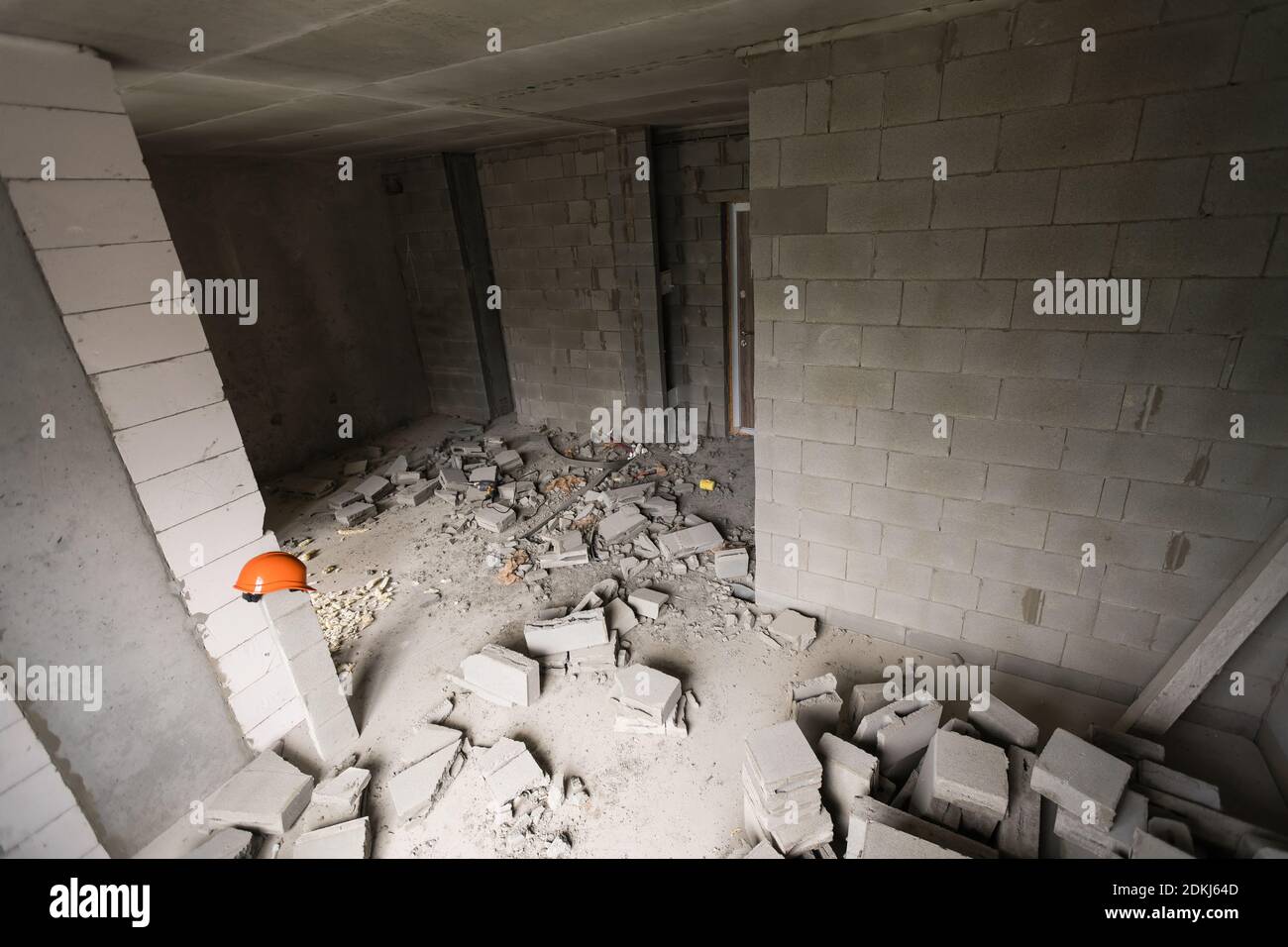 Wall smashed into debris room in apartment ready for renovation with ...