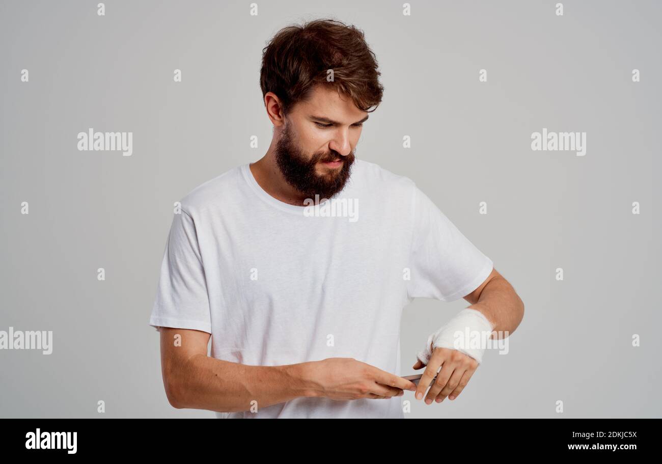 man with bandaged arm injury health problem hospital Stock Photo - Alamy