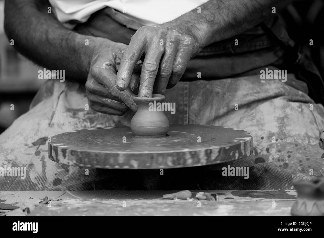 Pottery making spinning wheel clay Black and White Stock Photos ...