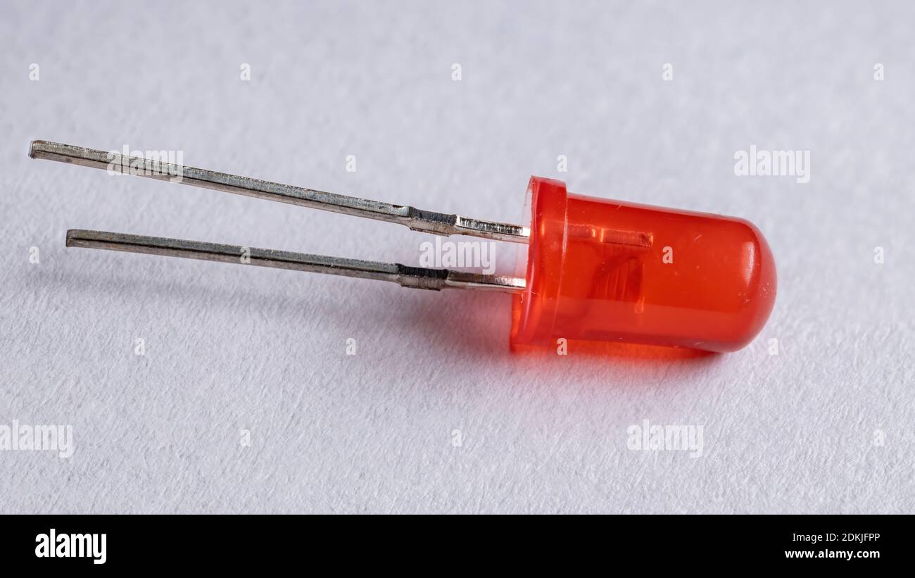 Small red LED on a white sheet Stock Photo - Alamy