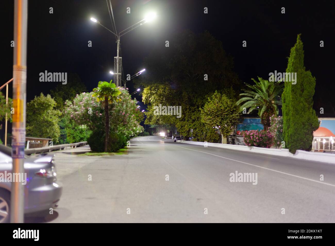 night road illuminated by lanterns Stock Photo - Alamy