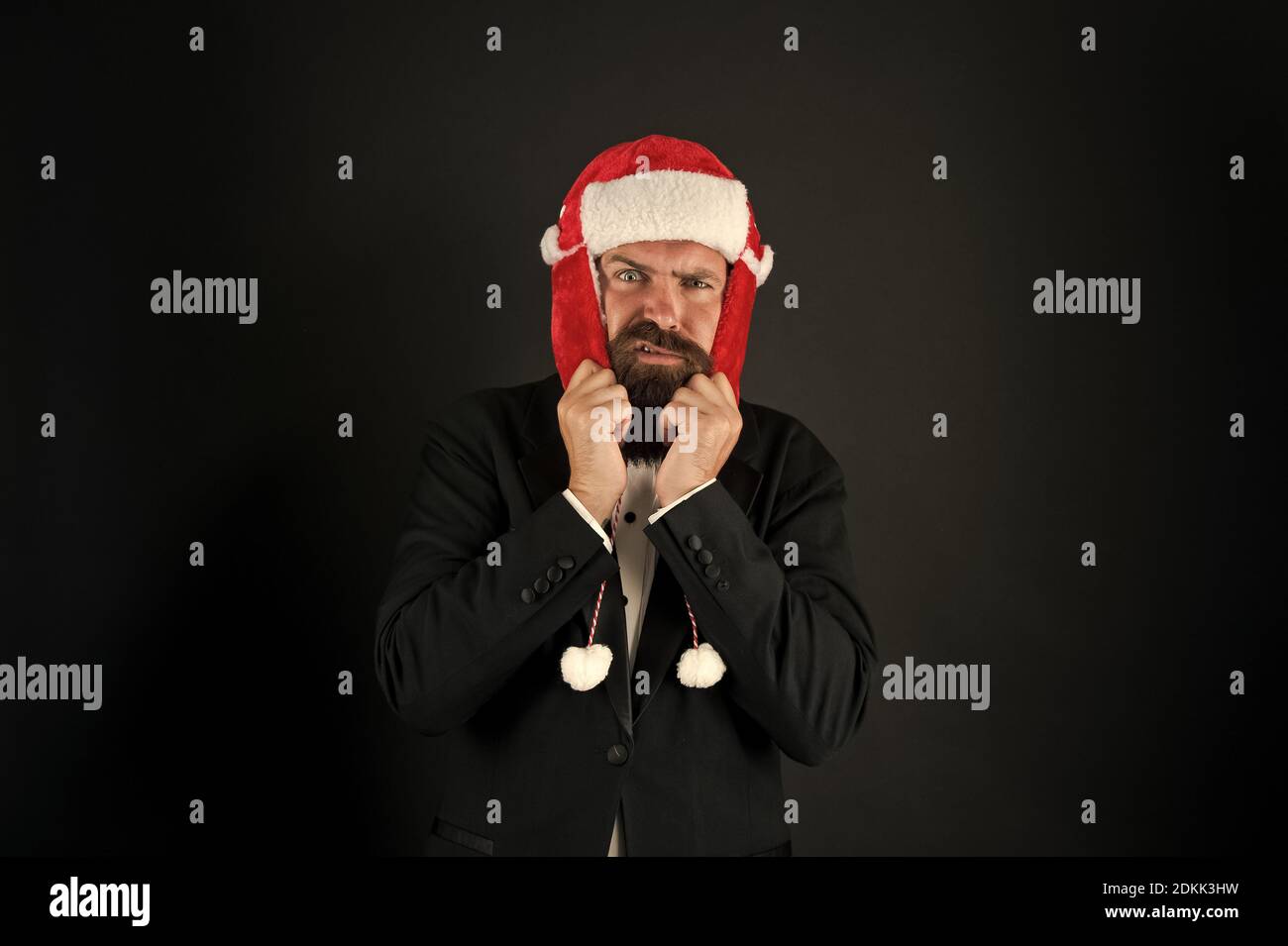 Feeling warmth. Funny winter hat. Business santa wish you financial ...