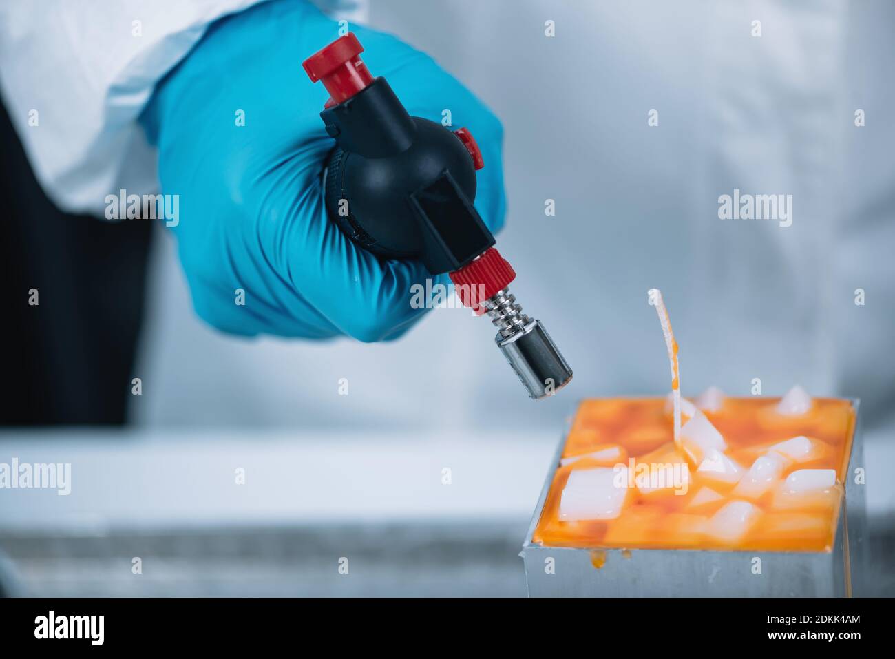 Holding expertise experiment manufacturing equipment hi-res stock ...