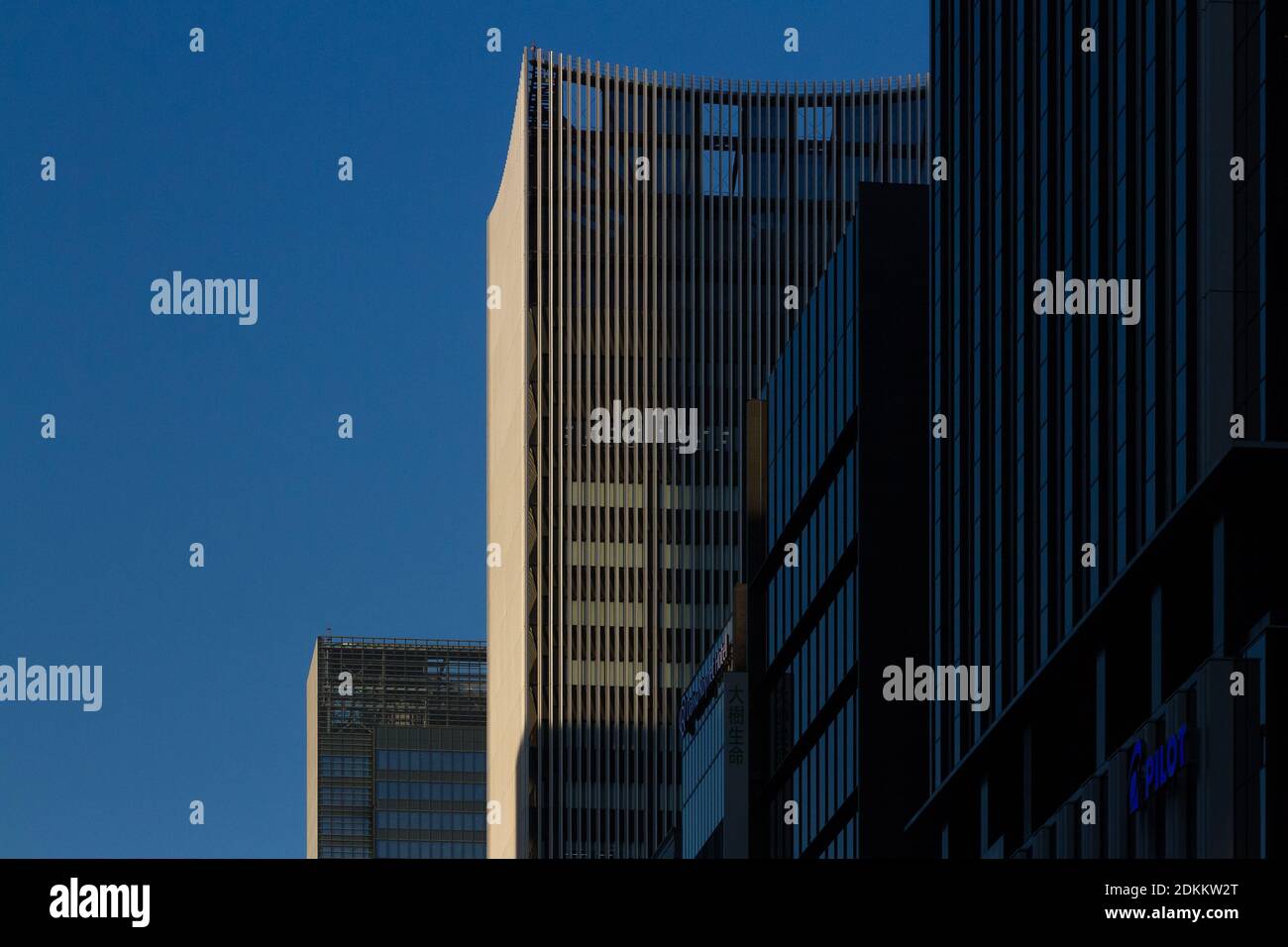 Abstract cityscape of modern tall buildings in Otemachi, Tokyo, Japan ...