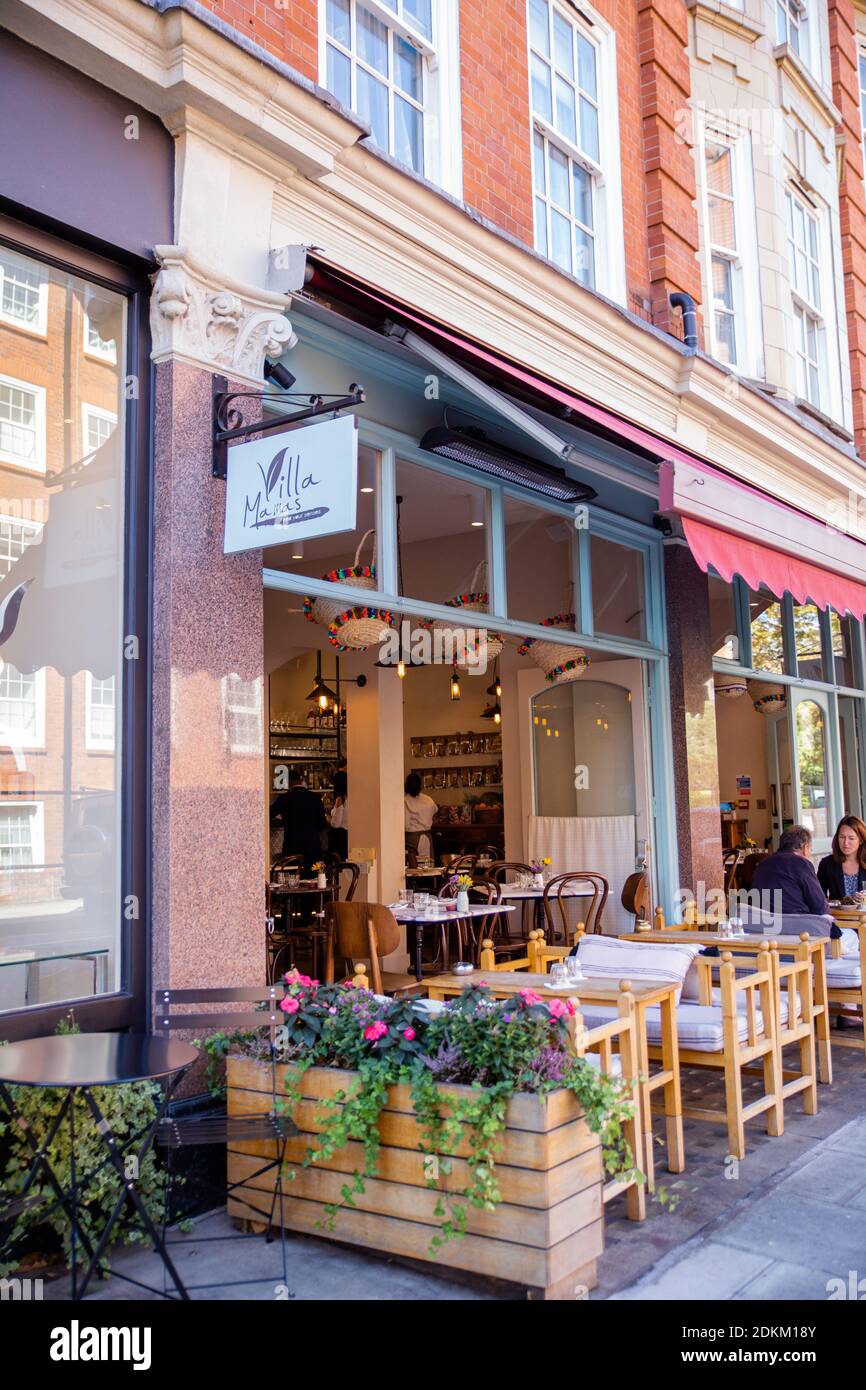 Front side of a Bahraini restaurant with people eaiting outside Stock ...
