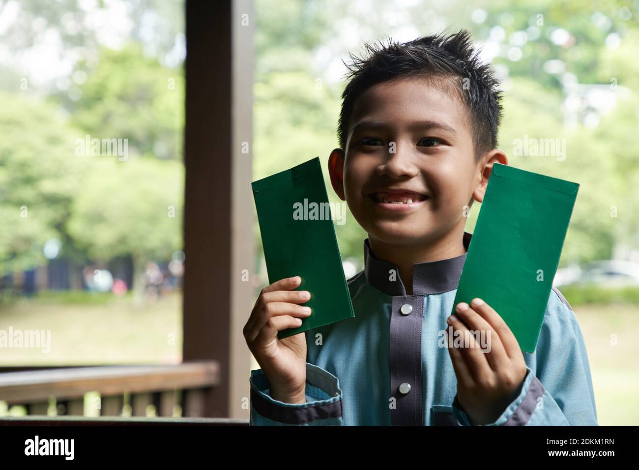 Boy receiving money hi-res stock photography and images - Alamy