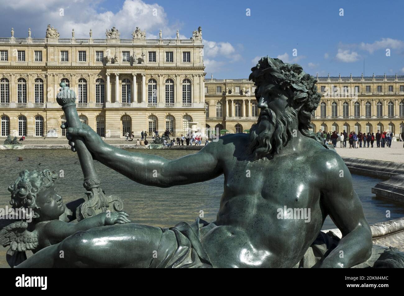 A bronze statue at the Palace of Versailles, a royal palace in ...