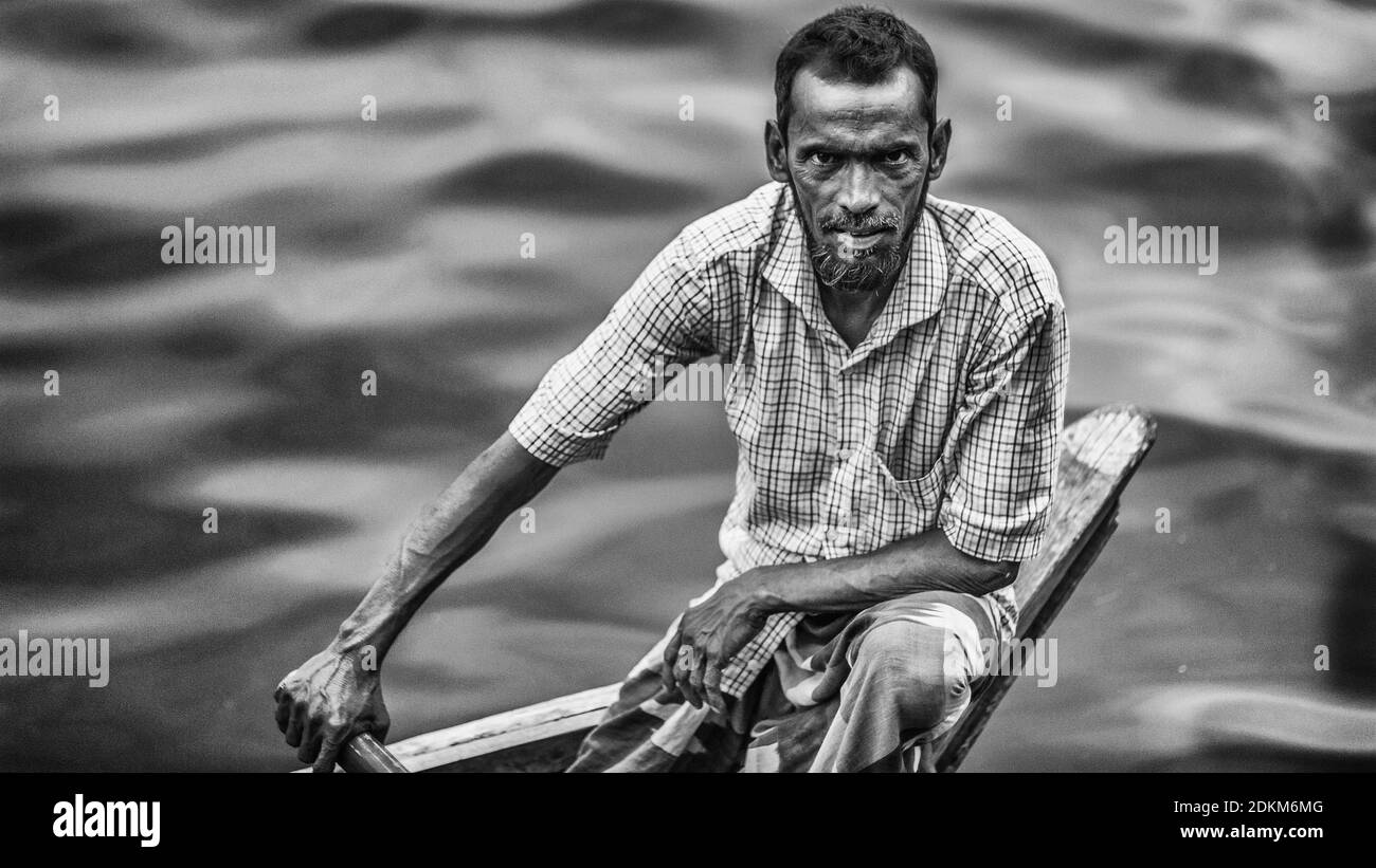 Indian man on boat Black and White Stock Photos & Images - Alamy
