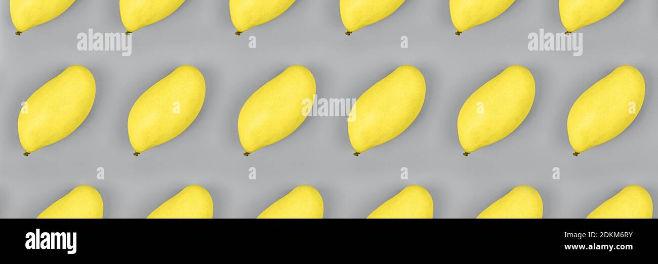 Fresh mango on gray background. Colors of the year 2021: ultimate gray ...