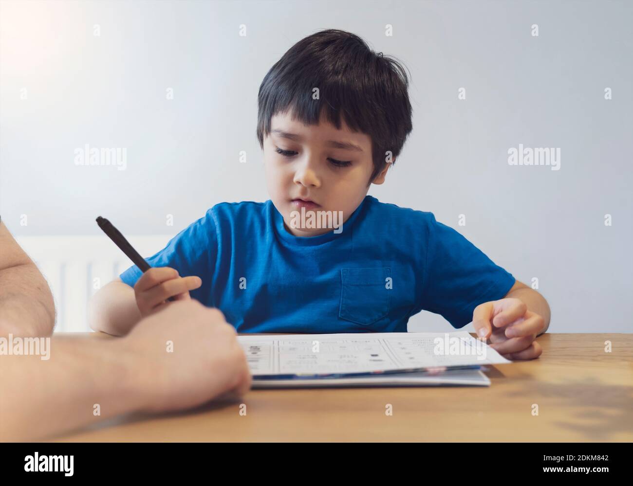 Child writing on wall of house hi-res stock photography and images - Alamy