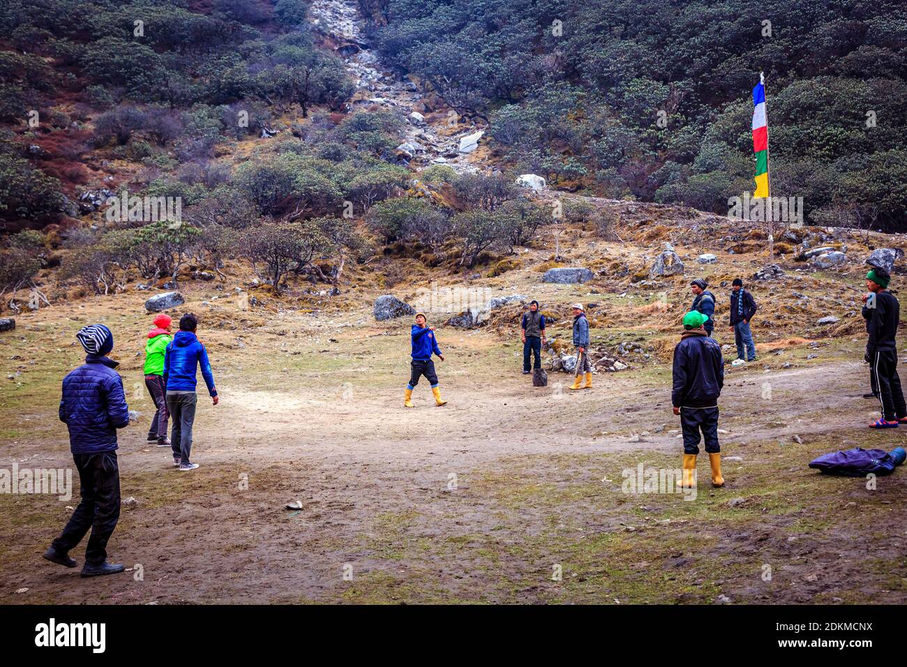 View of local people playing cricket at a resting camp on the Gochela ...