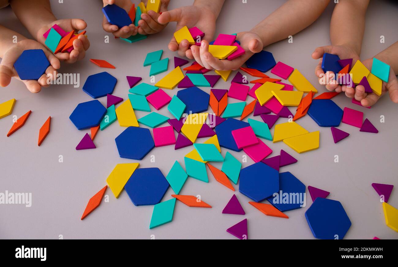 Preschool children building with wooden blocks. Kids development Stock ...