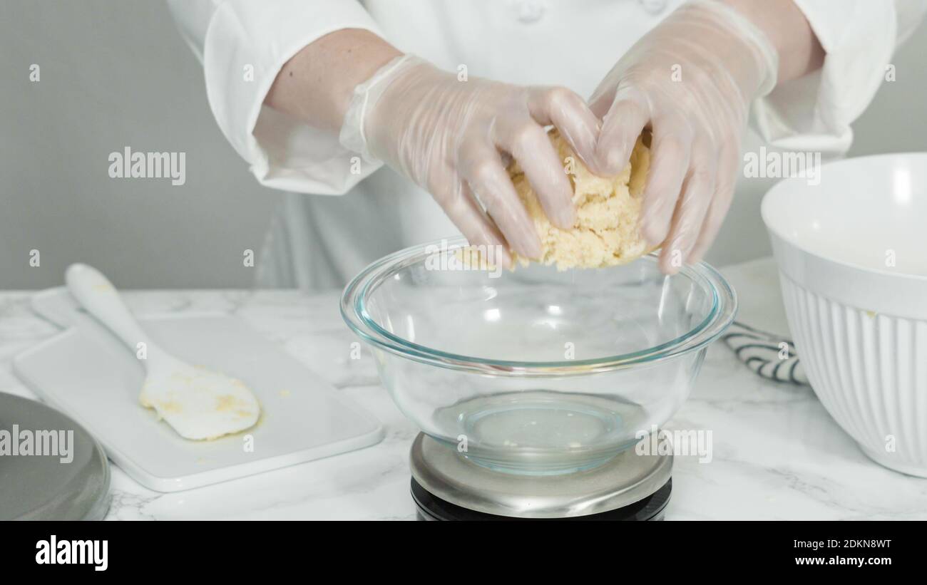 Step by step. Measuring cookie dought with a digital kitchen scale to ...