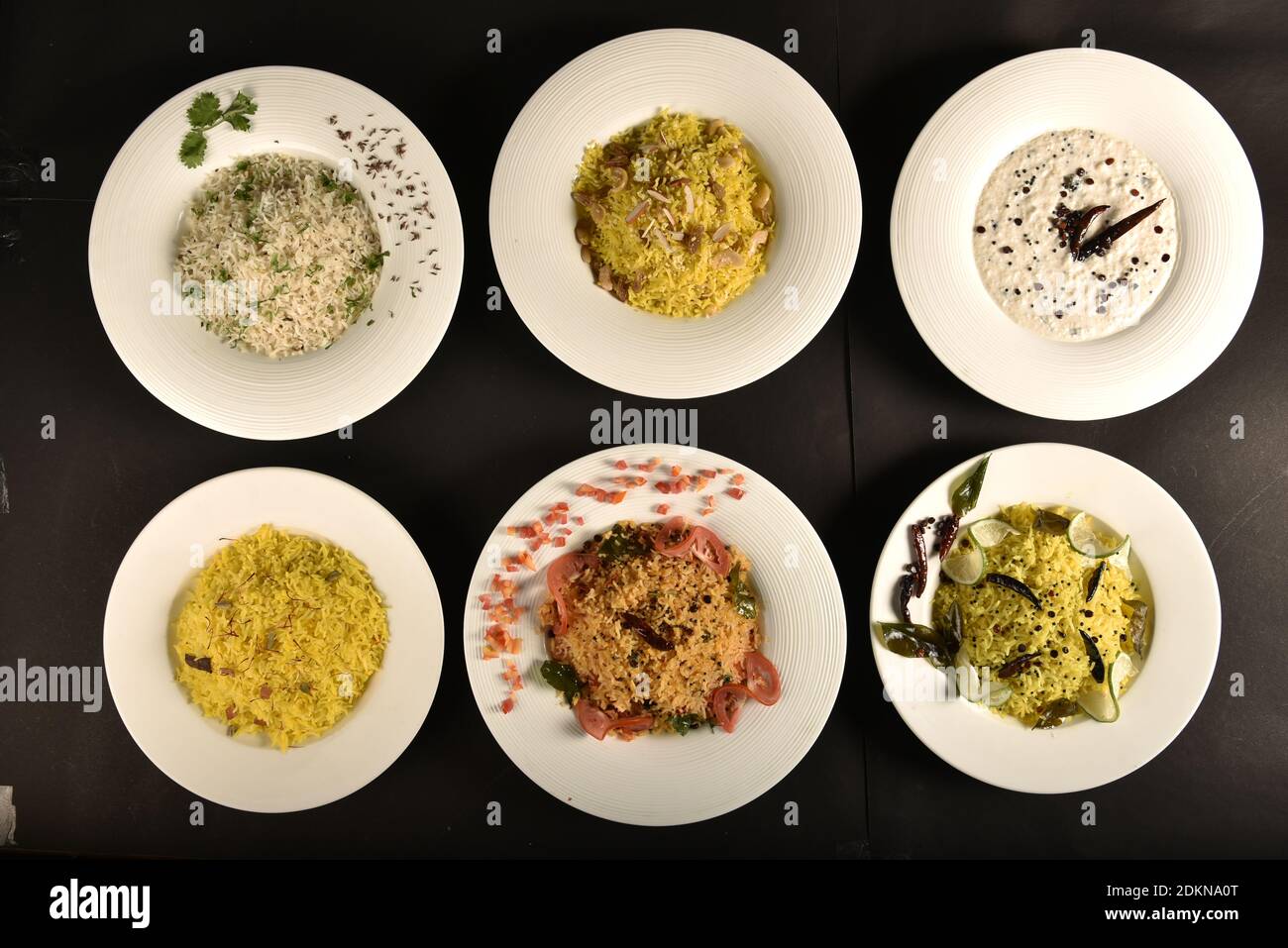 five rice dishes of different flavours served in one table with spicy ...