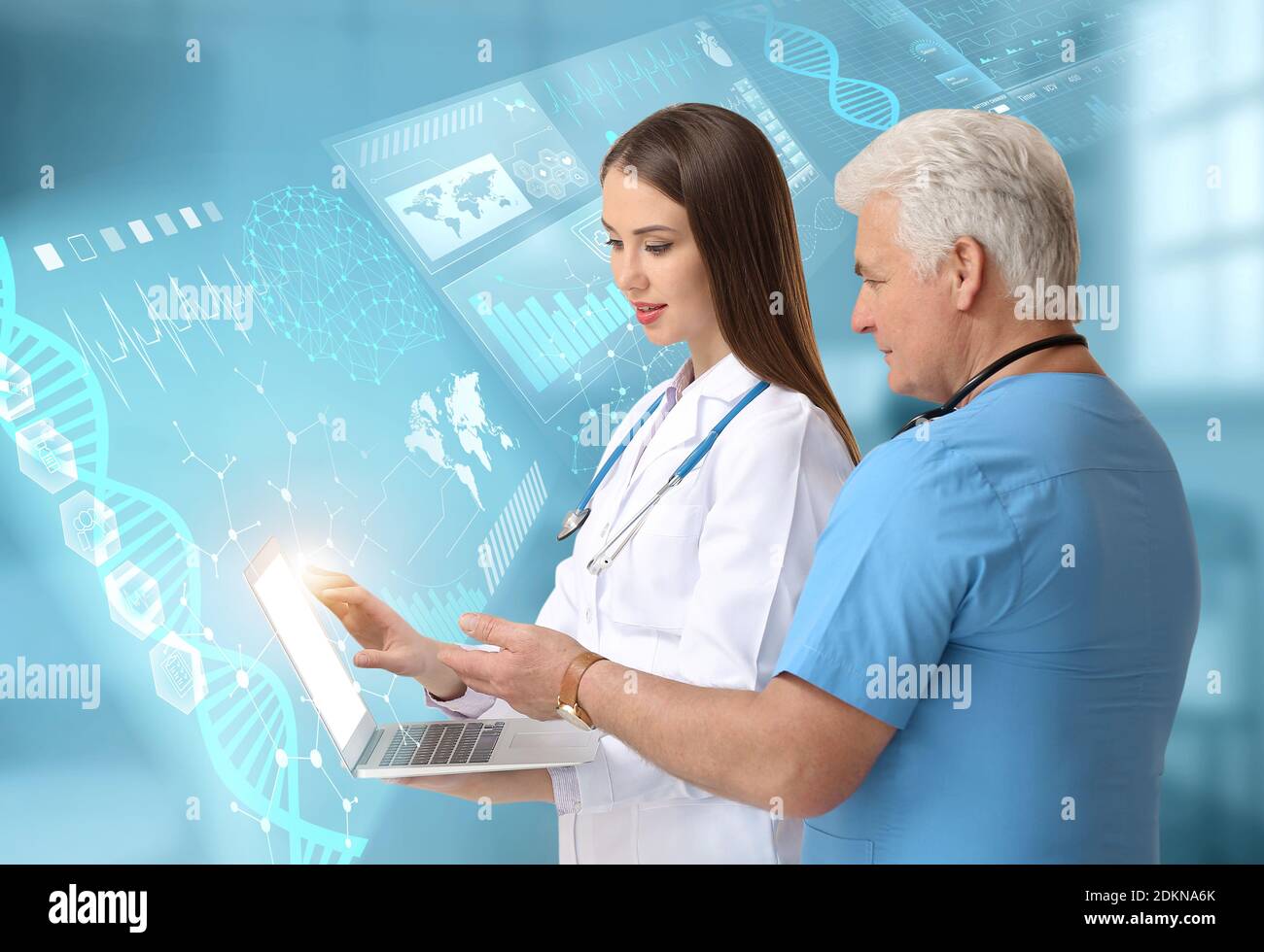 Doctors using virtual screen in clinic Stock Photo - Alamy