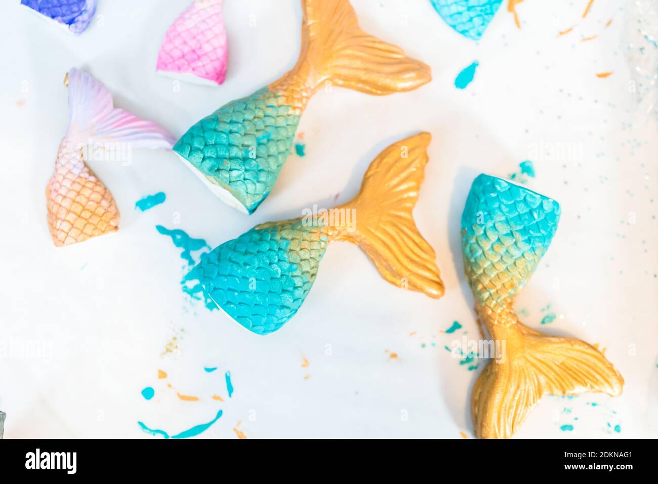 Mermaid tails made out of modeling clay and painted with acrylic paint ...