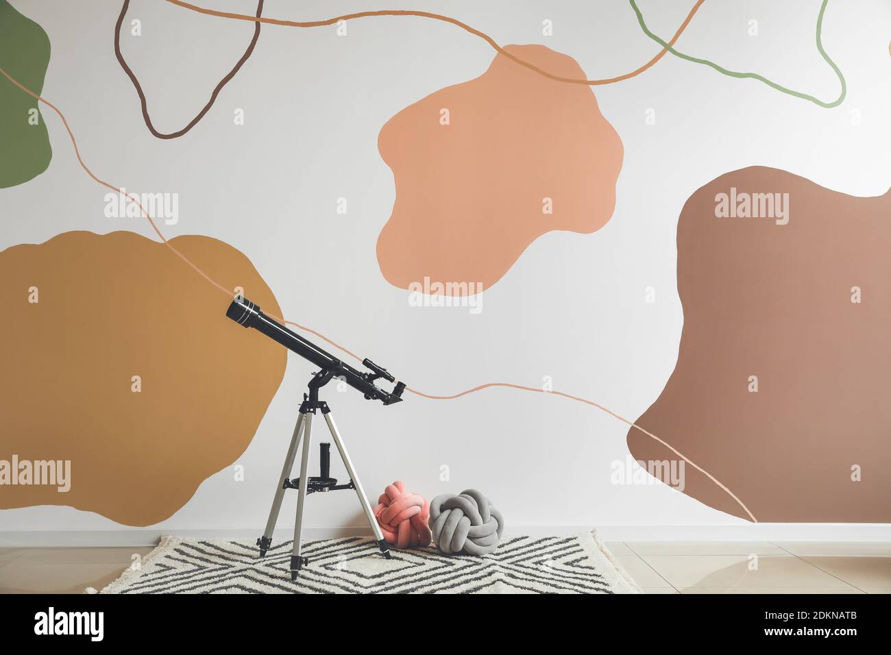 Interior of stylish room with modern telescope Stock Photo - Alamy