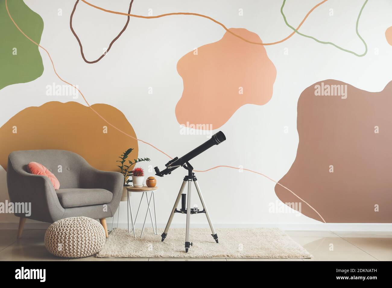 Interior of stylish room with modern telescope Stock Photo - Alamy