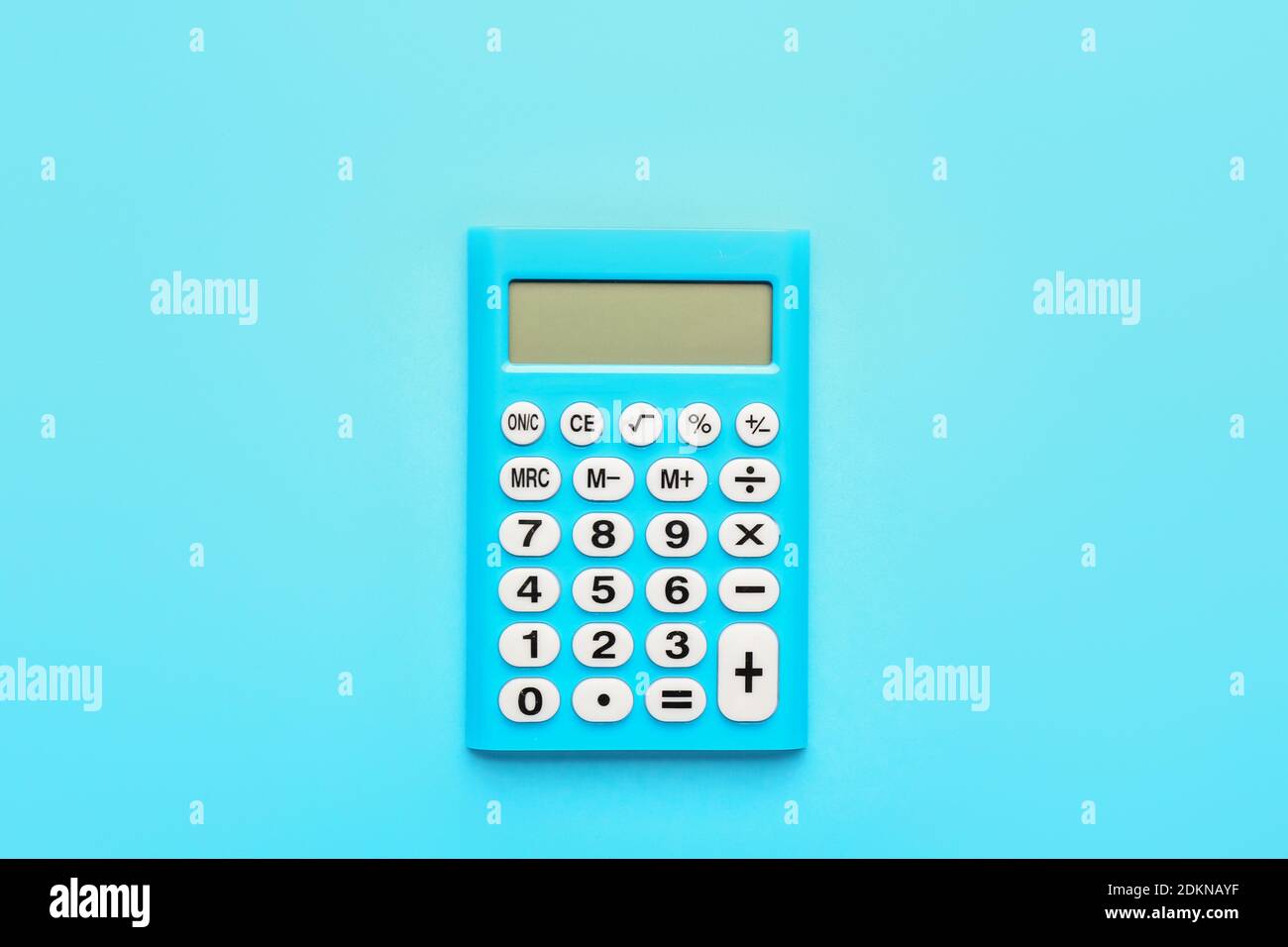 Digital calculator on color background Stock Photo - Alamy