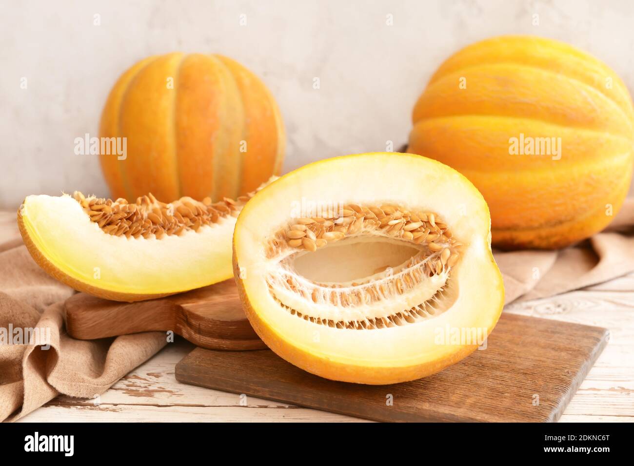 Sweet cut melon on table Stock Photo - Alamy