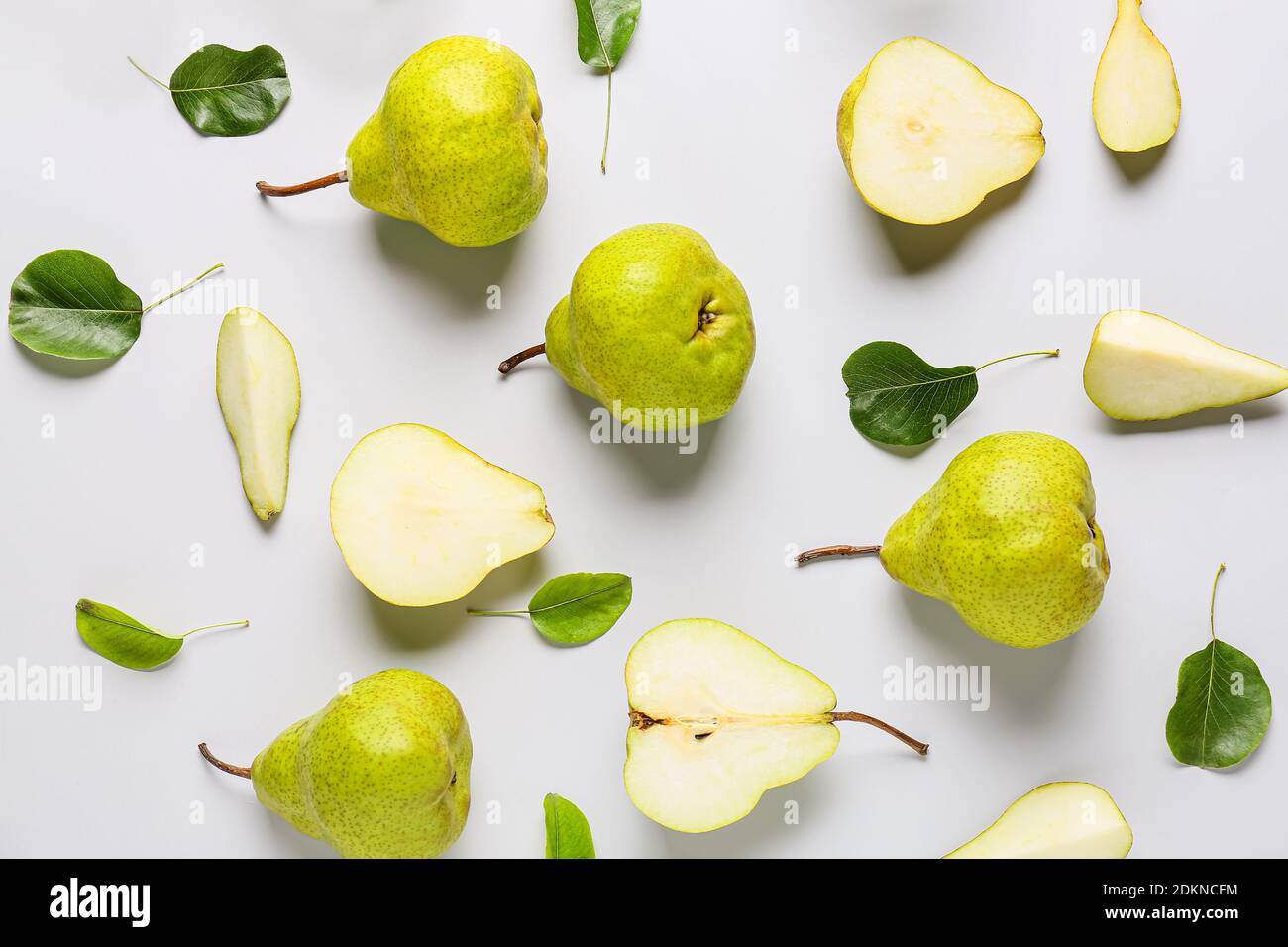 Fresh ripe pears on light background Stock Photo - Alamy