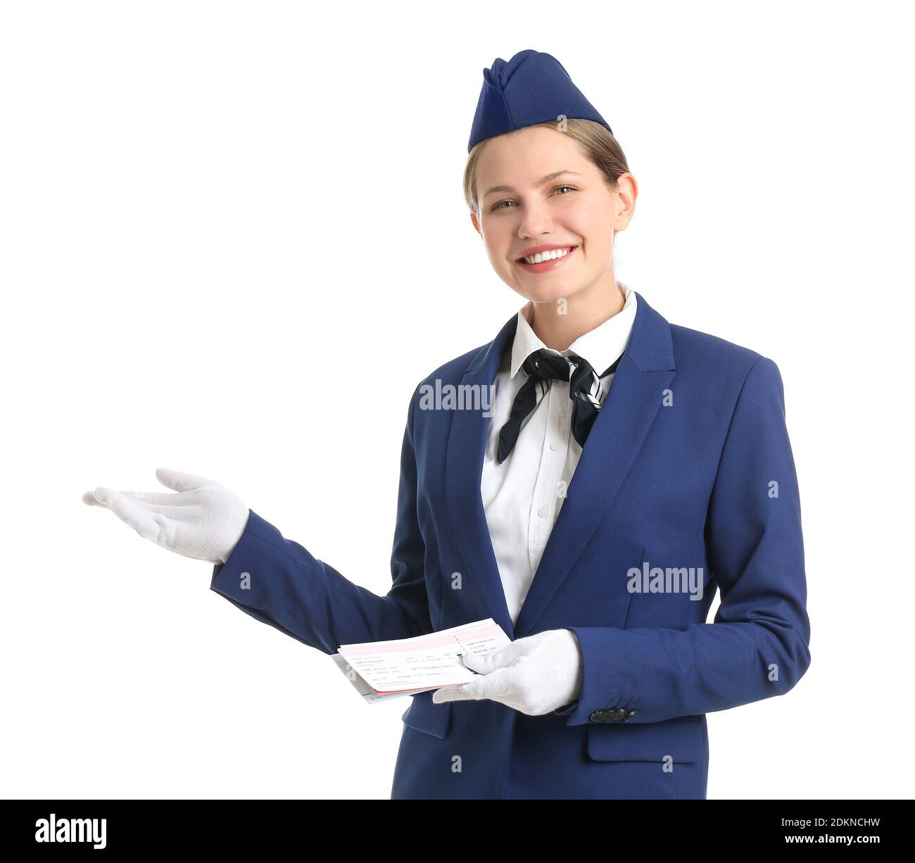 Beautiful stewardess showing something on white background Stock Photo ...