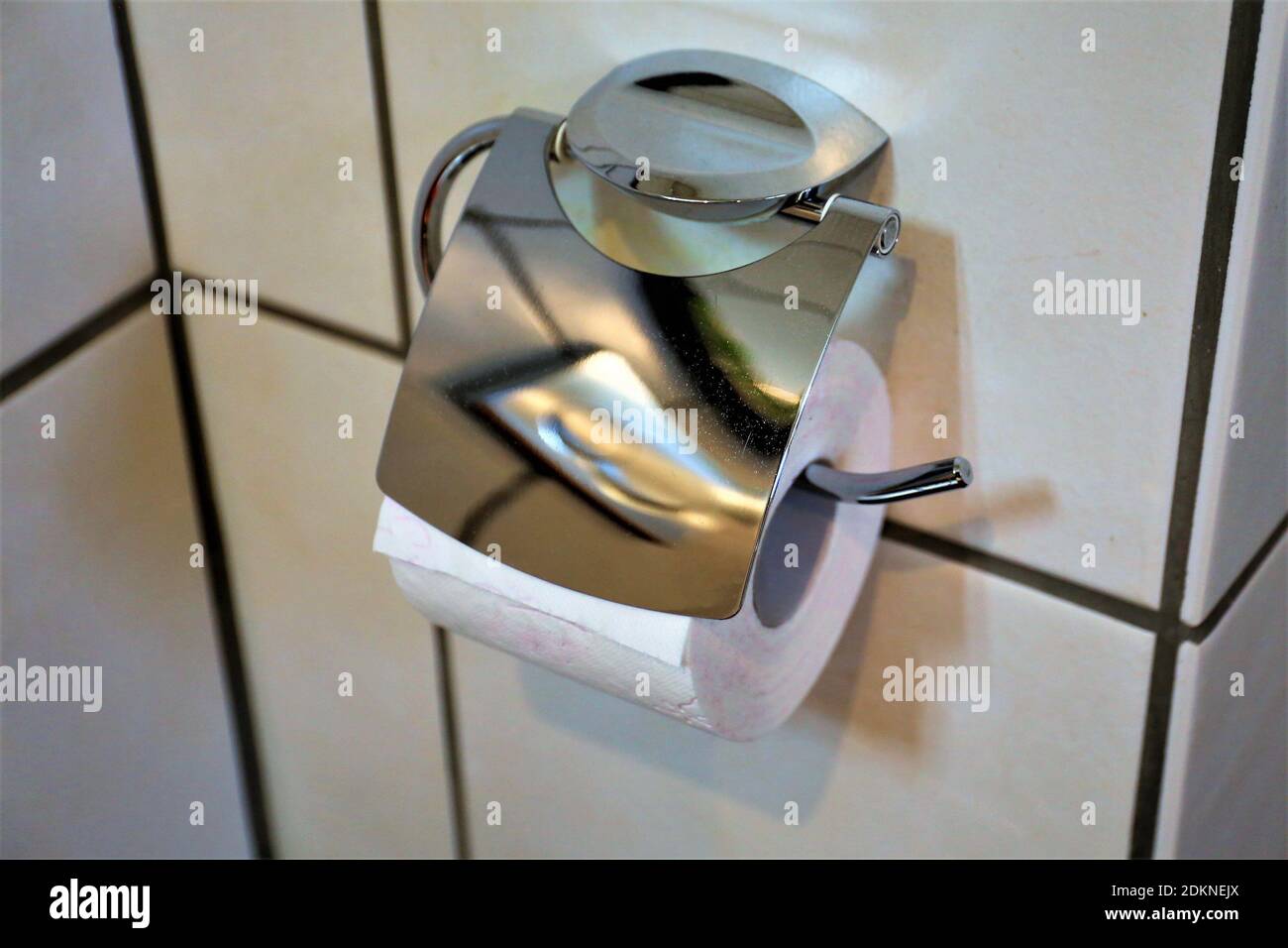 An concept Image of a bathroom with toilet paper Stock Photo - Alamy